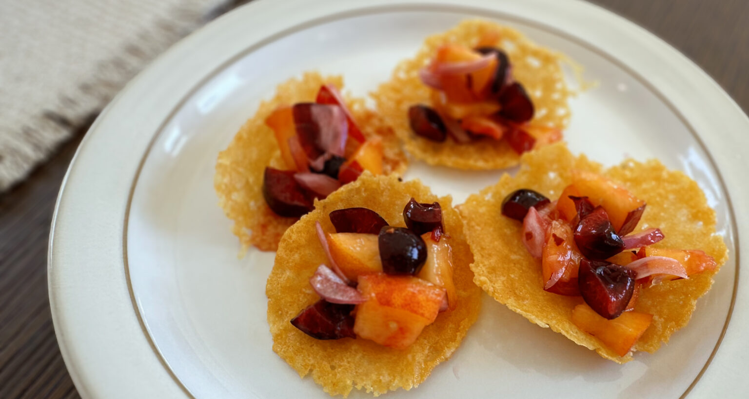Parmesan frico with stone fruit bruschetta - Refinelife